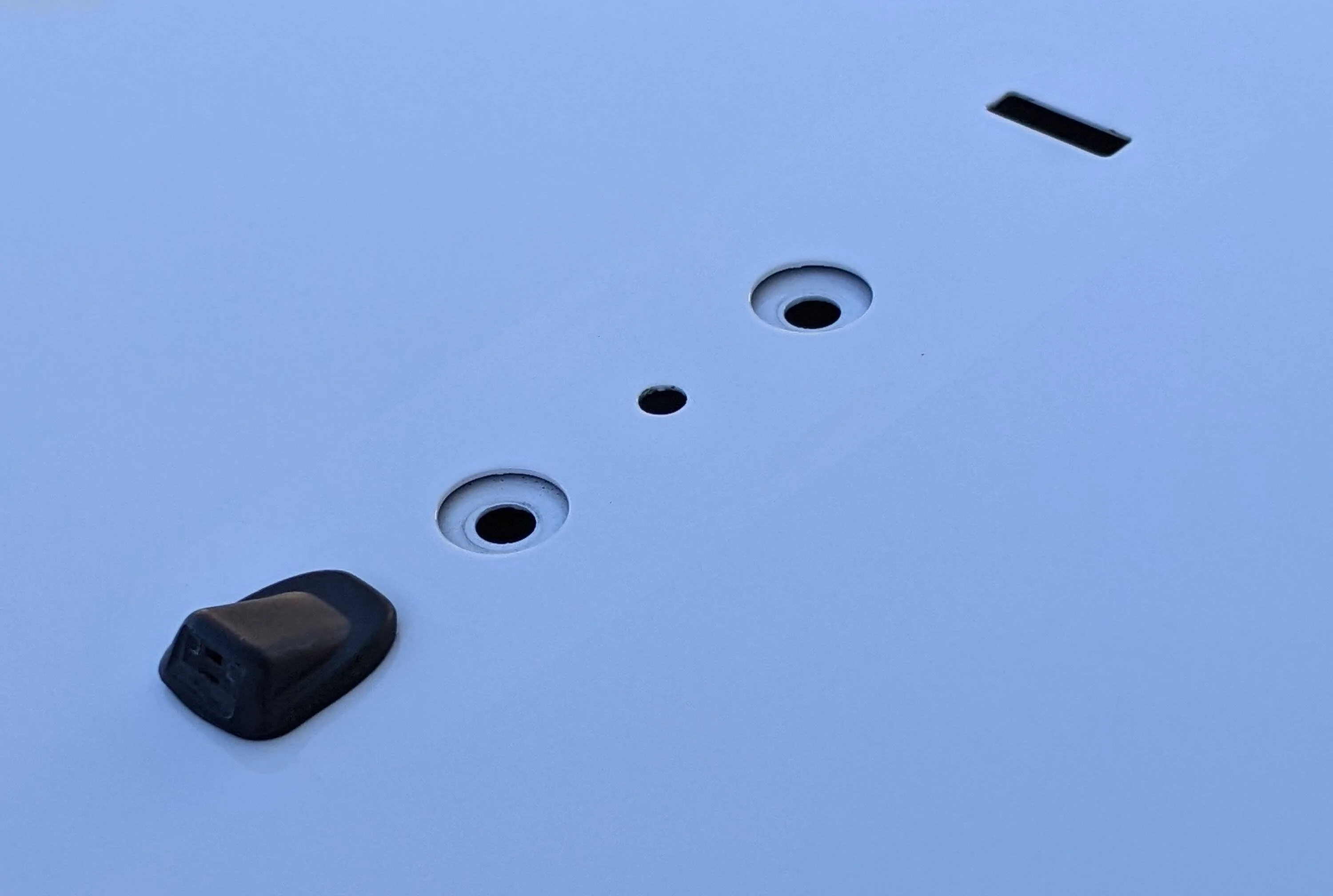 Windshield rests/washer nozzles - denting or cupping in hood at mount ...
